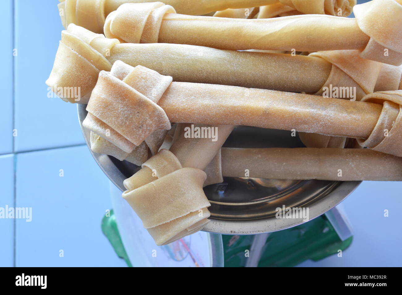 dog bone on weighing scale for sale Stock Photo - Alamy