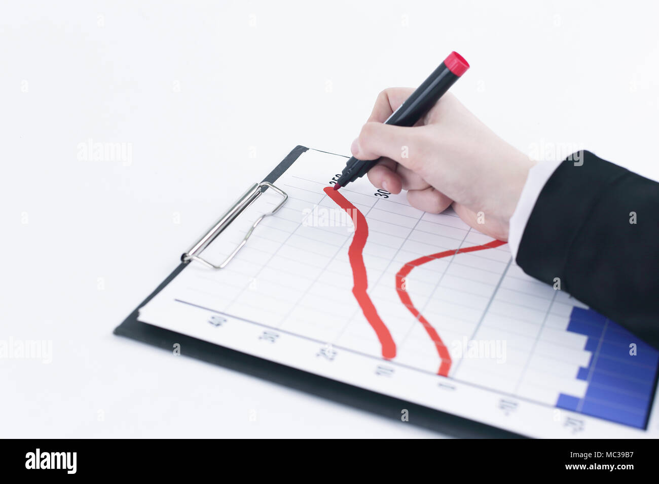 closeup .Businessman drawing a stock chart.isolated on white Stock ...