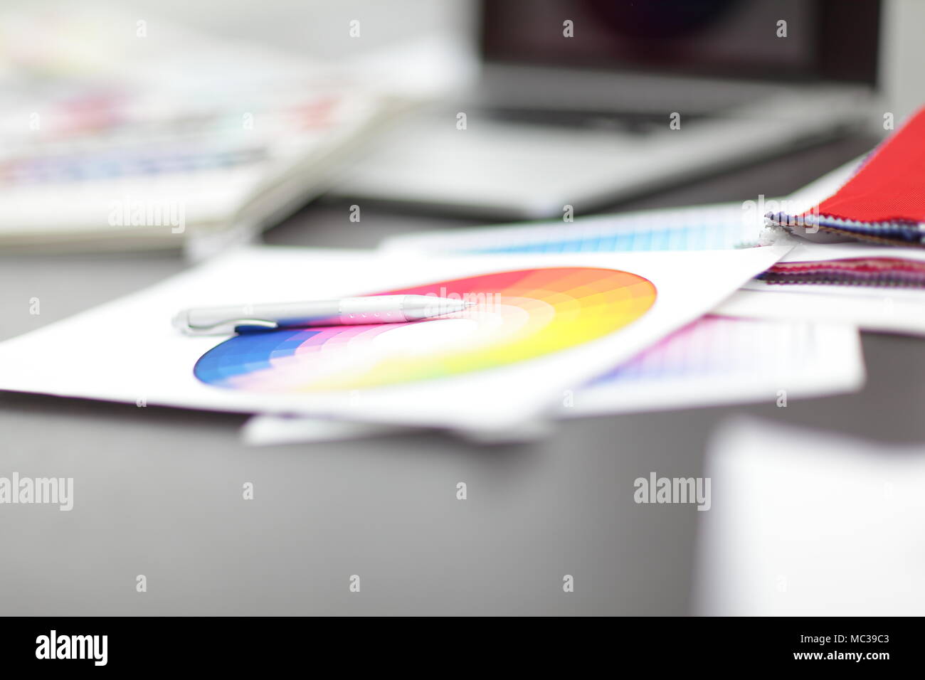 pen and sketches on the table of the designer Stock Photo - Alamy