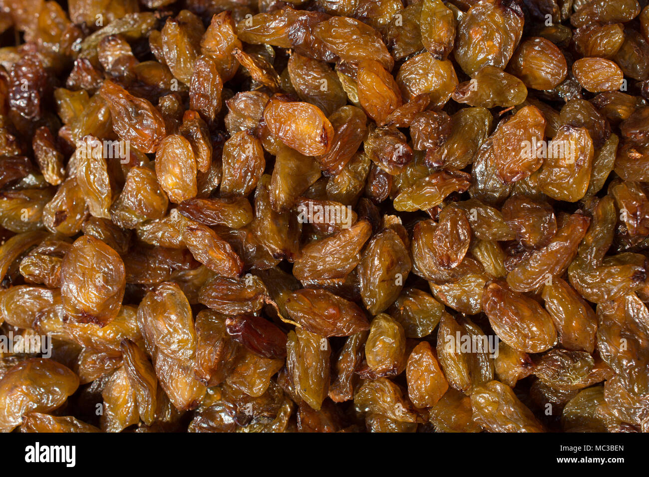Raisins as background Grape Raisin texture in view Stock Photo - Alamy