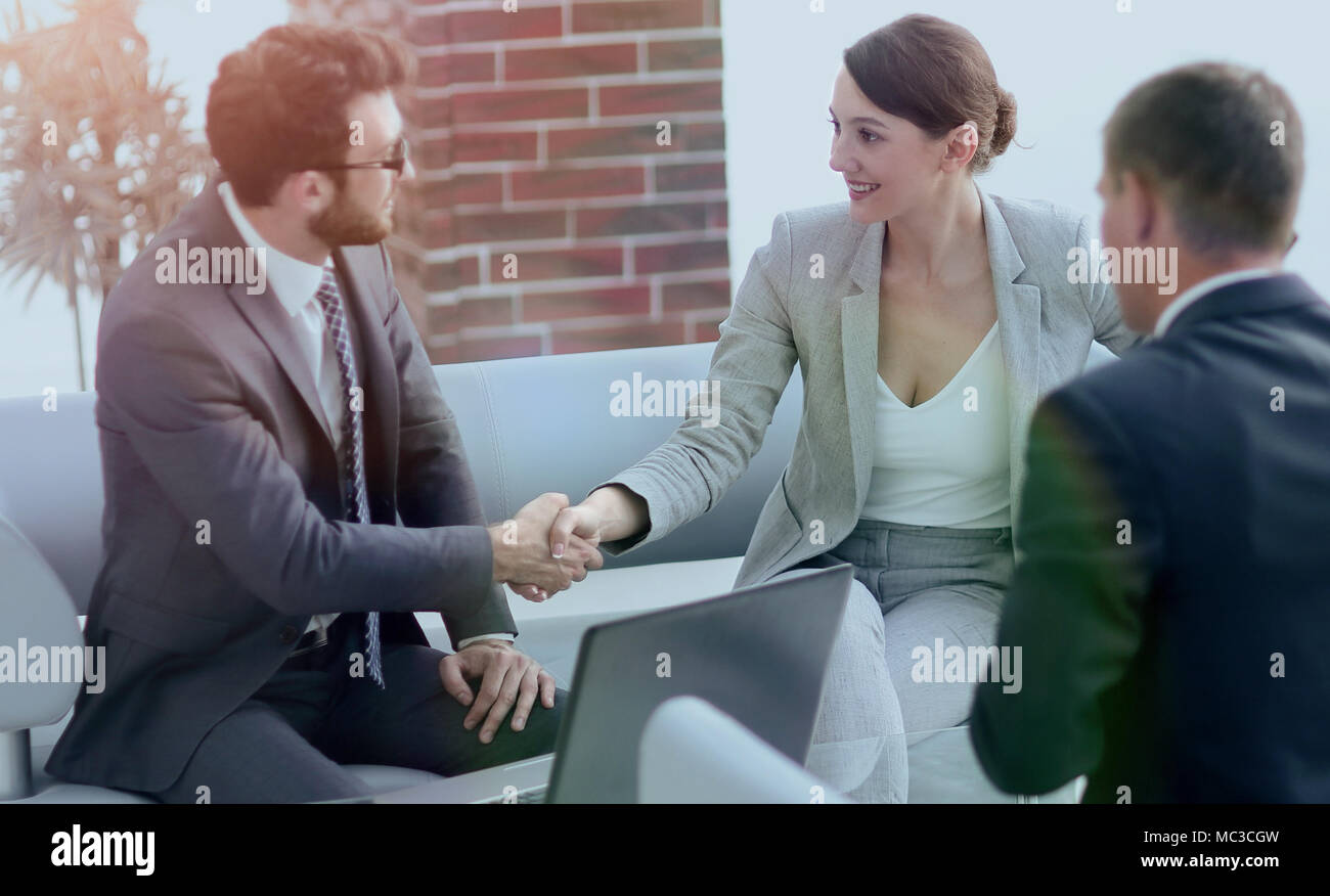 business handshake women with the client Stock Photo - Alamy
