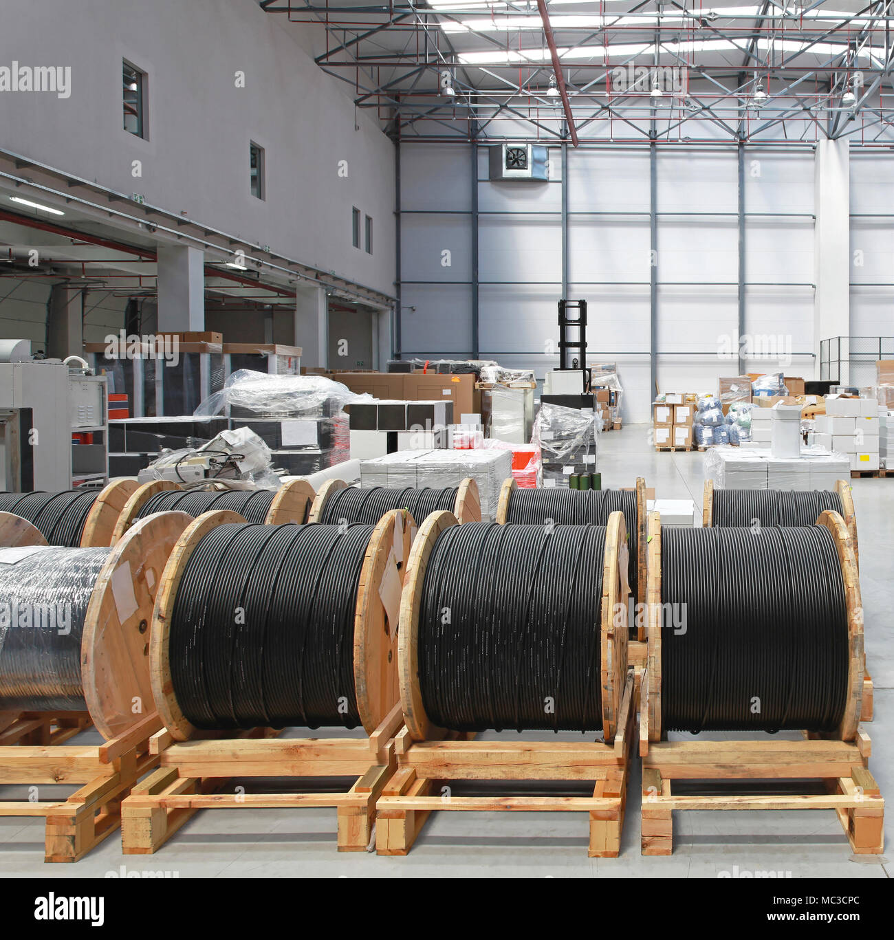 Cable Reels at Pallets in Storage Warehouse Stock Photo - Alamy