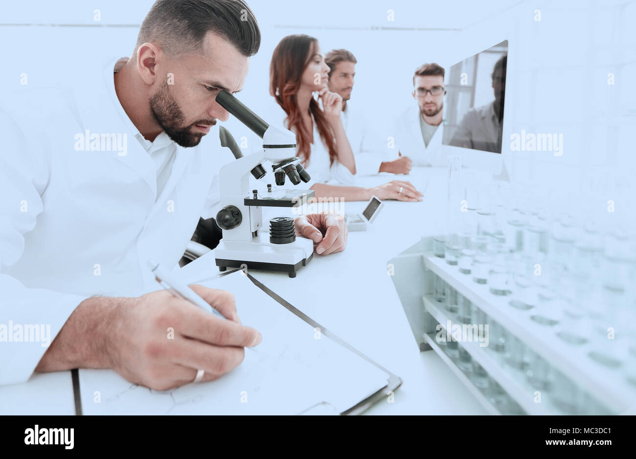 young scientist works in the lab.concept of teamwork Stock Photo - Alamy