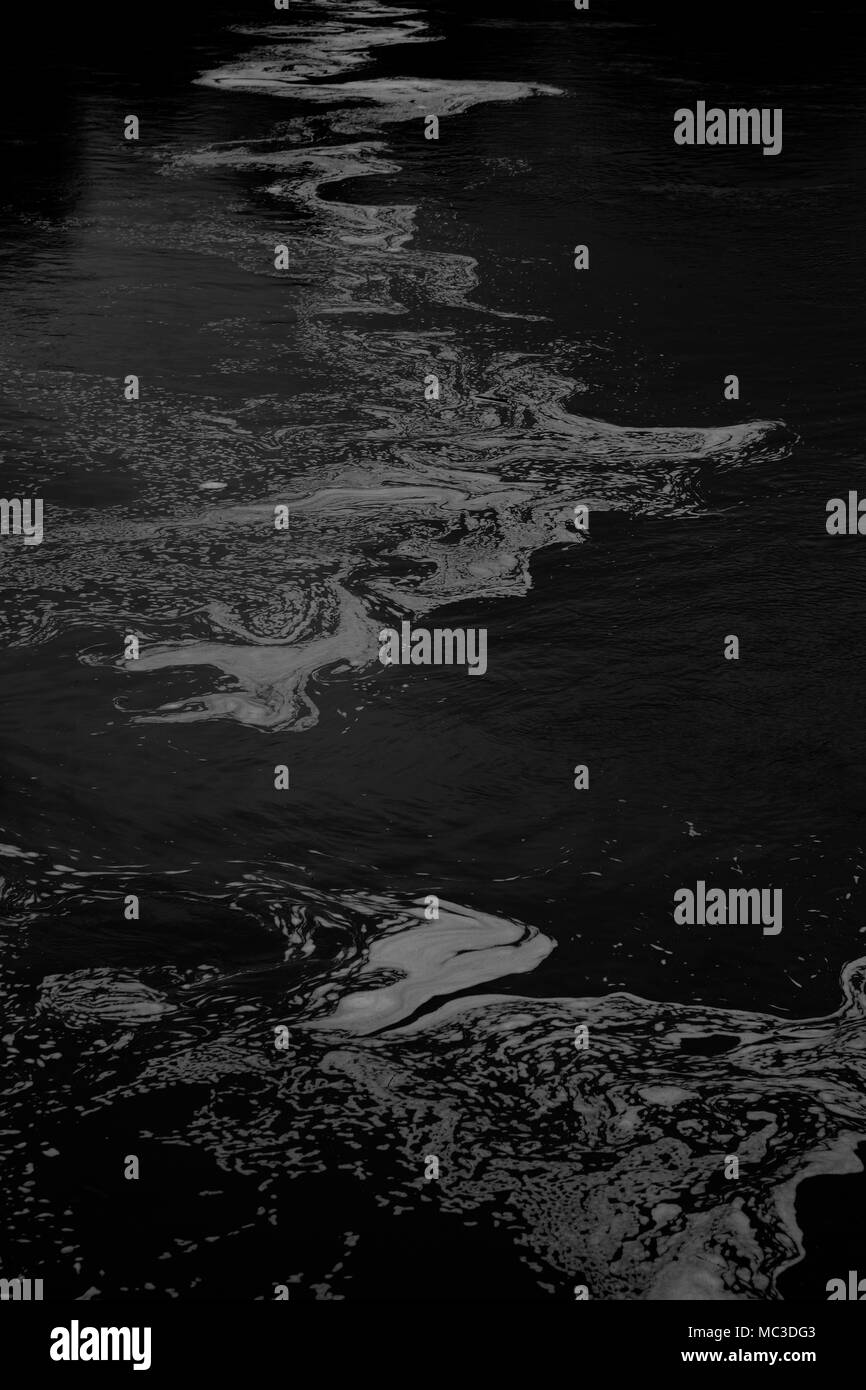 Black and White Abstract of Swirling Foam on the Surface of the River ...