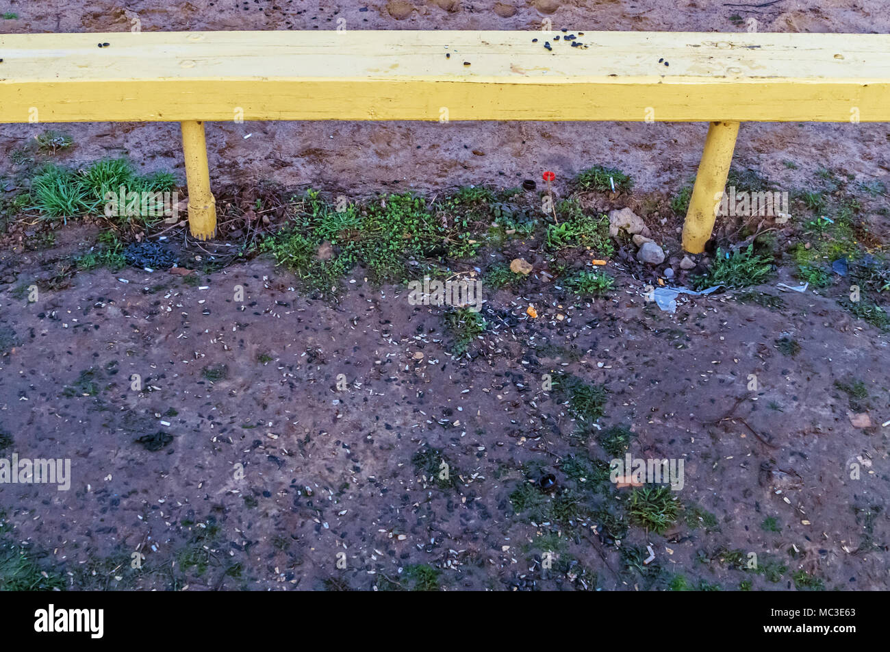 The littered area near benches on the sports ground Stock Photo - Alamy