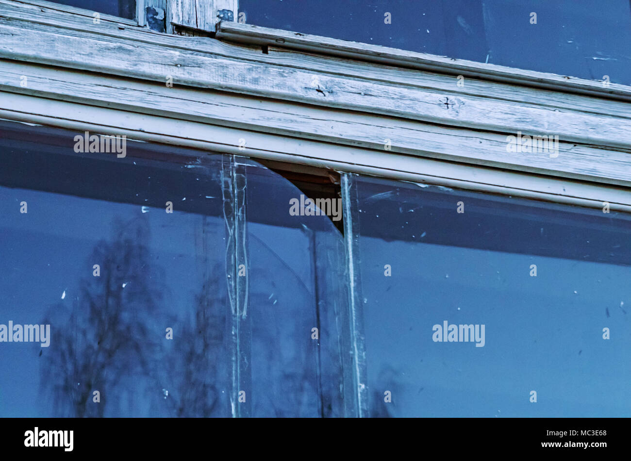 Reflection in old windows glass Stock Photo - Alamy