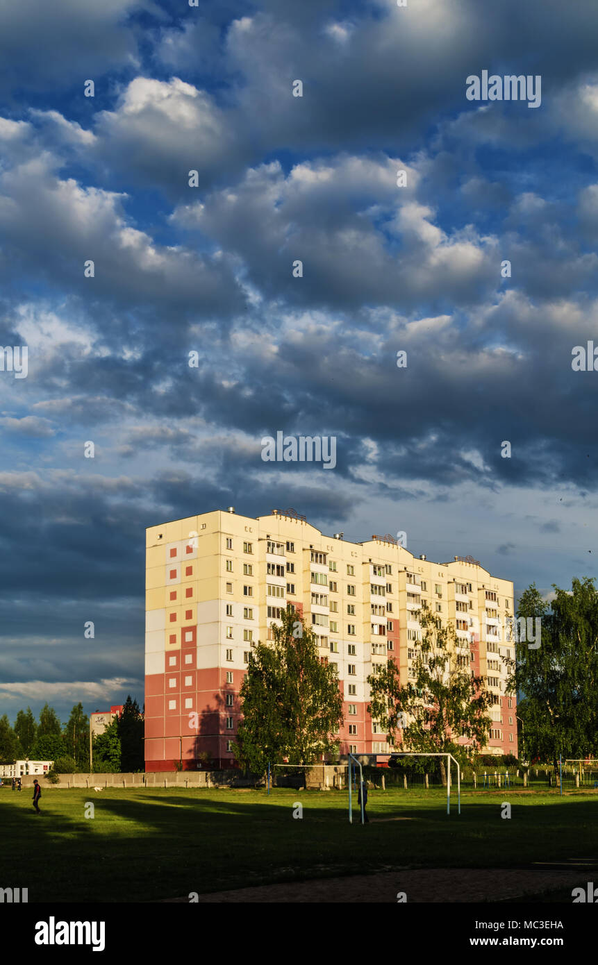 Evening sky over city buildings Stock Photo - Alamy