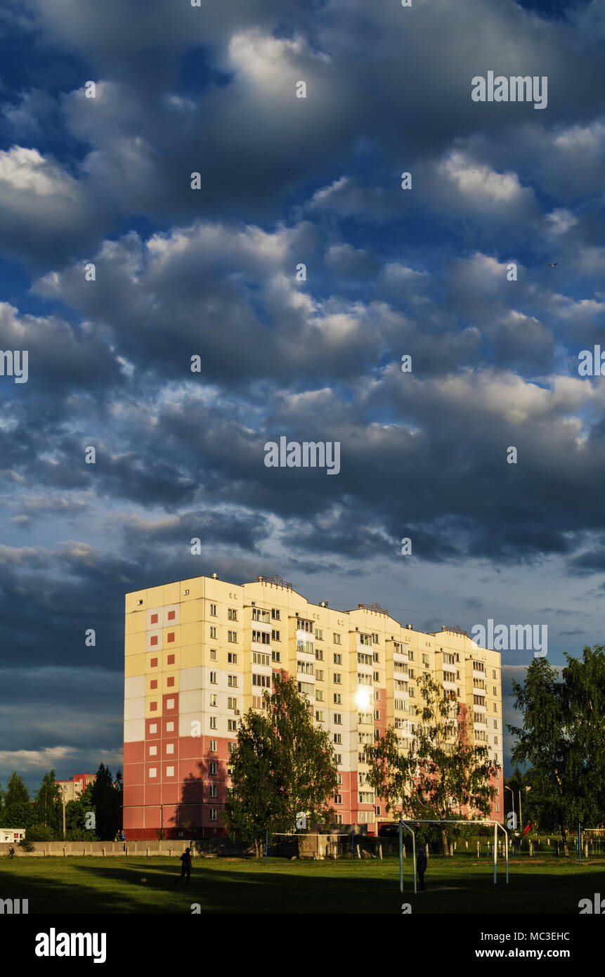 Evening sky over city buildings Stock Photo - Alamy