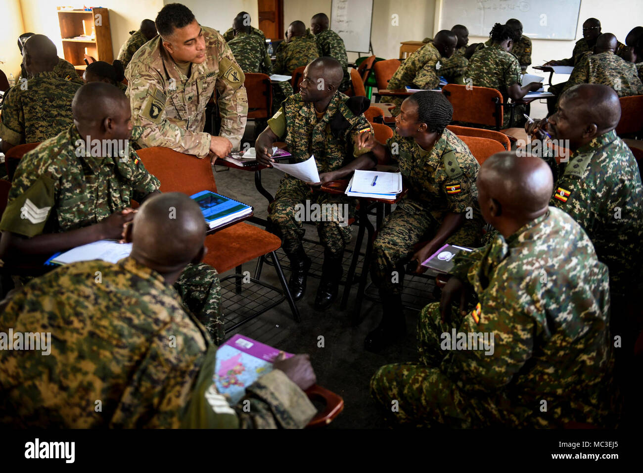 U.S. Army Staff Sgt. Damon Boxley, team sergeant from Charlie Company ...