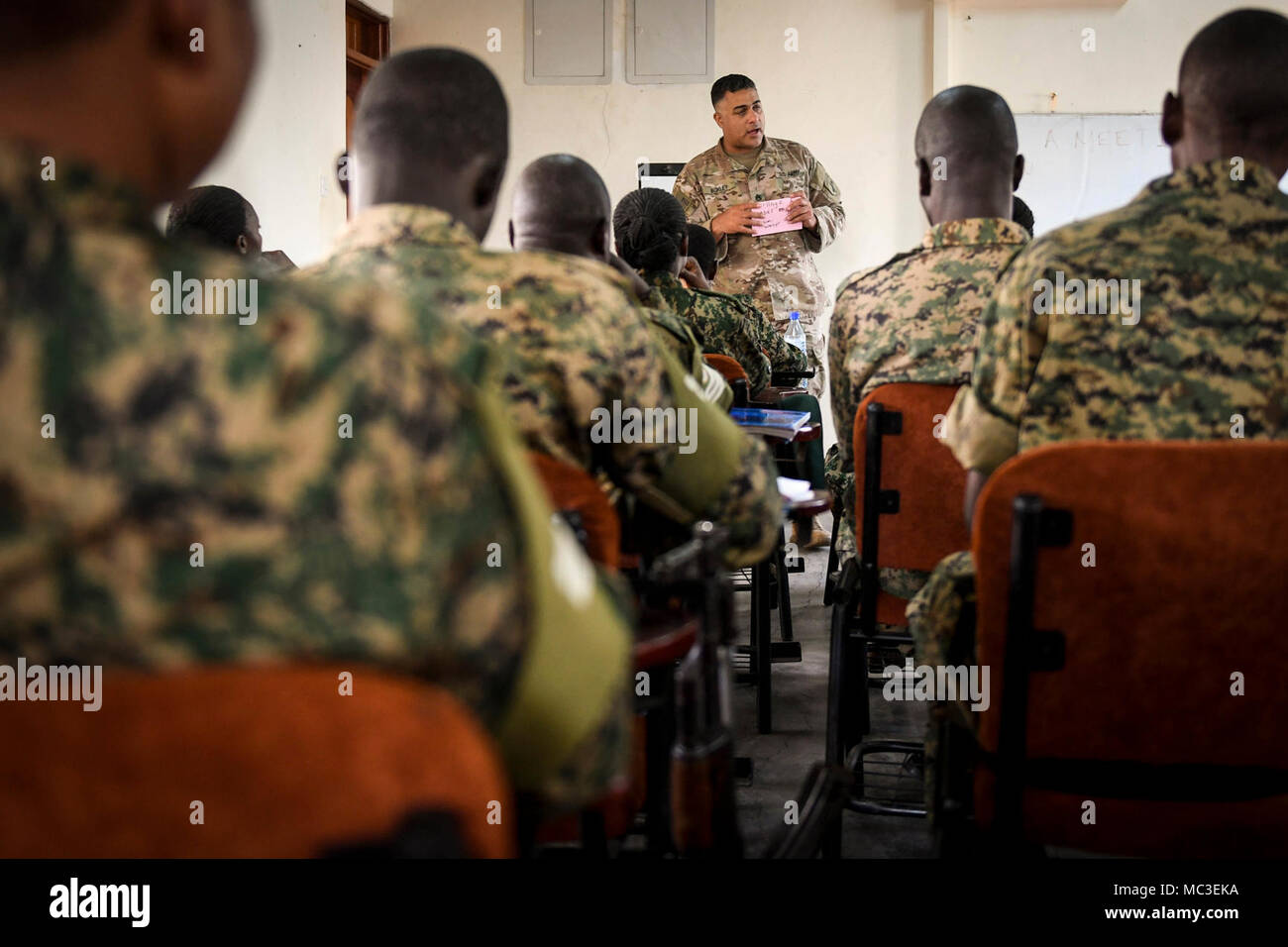 U.S. Army Staff Sgt. Damon Boxley, team sergeant from Charlie Company ...