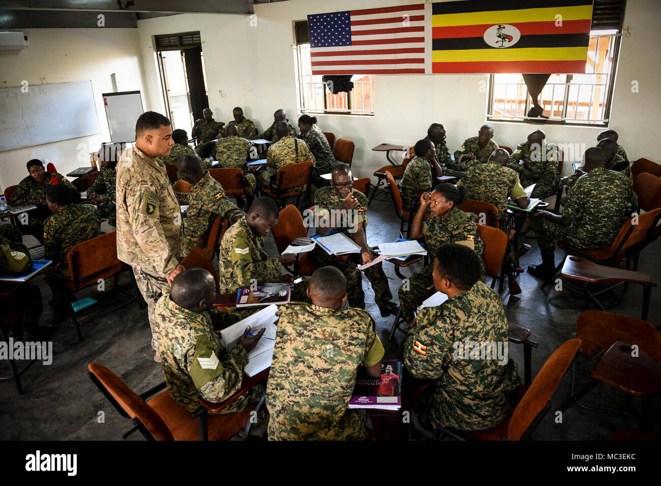U.S. Army Staff Sgt. Damon Boxley, team sergeant from Charlie Company ...