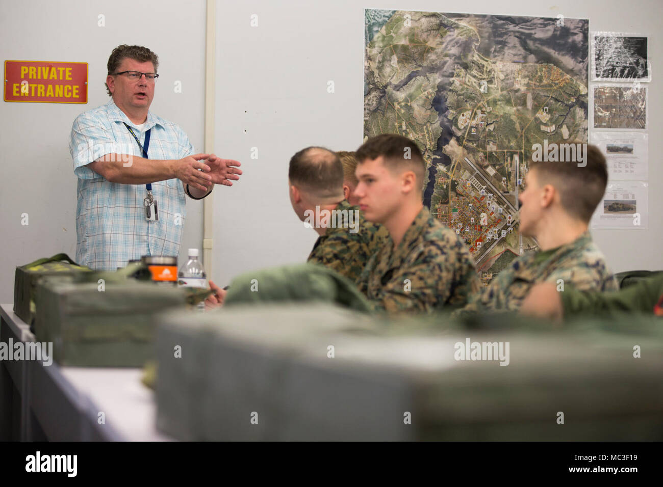Brian C. Hawkins, left, teaches a class to U.S. Marines with the 2nd ...