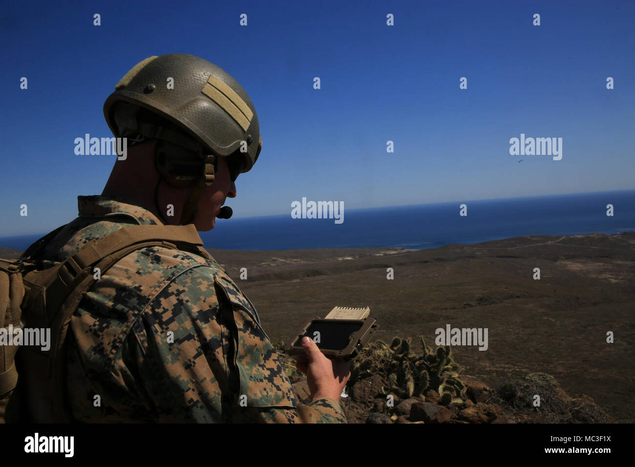 Staff Sgt. Randall Lester, the supporting arms liaison team chief, with ...