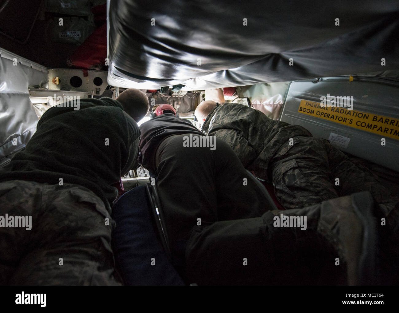 Members of the 124th Fighter Wing fly aboard a KC-135 during an aerial ...