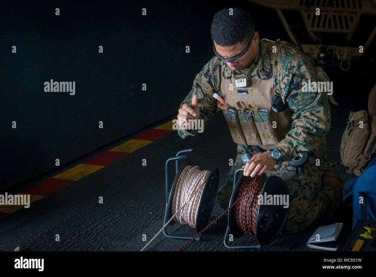 An Explosive Ordnance Disposal technician with Combat Logistics ...