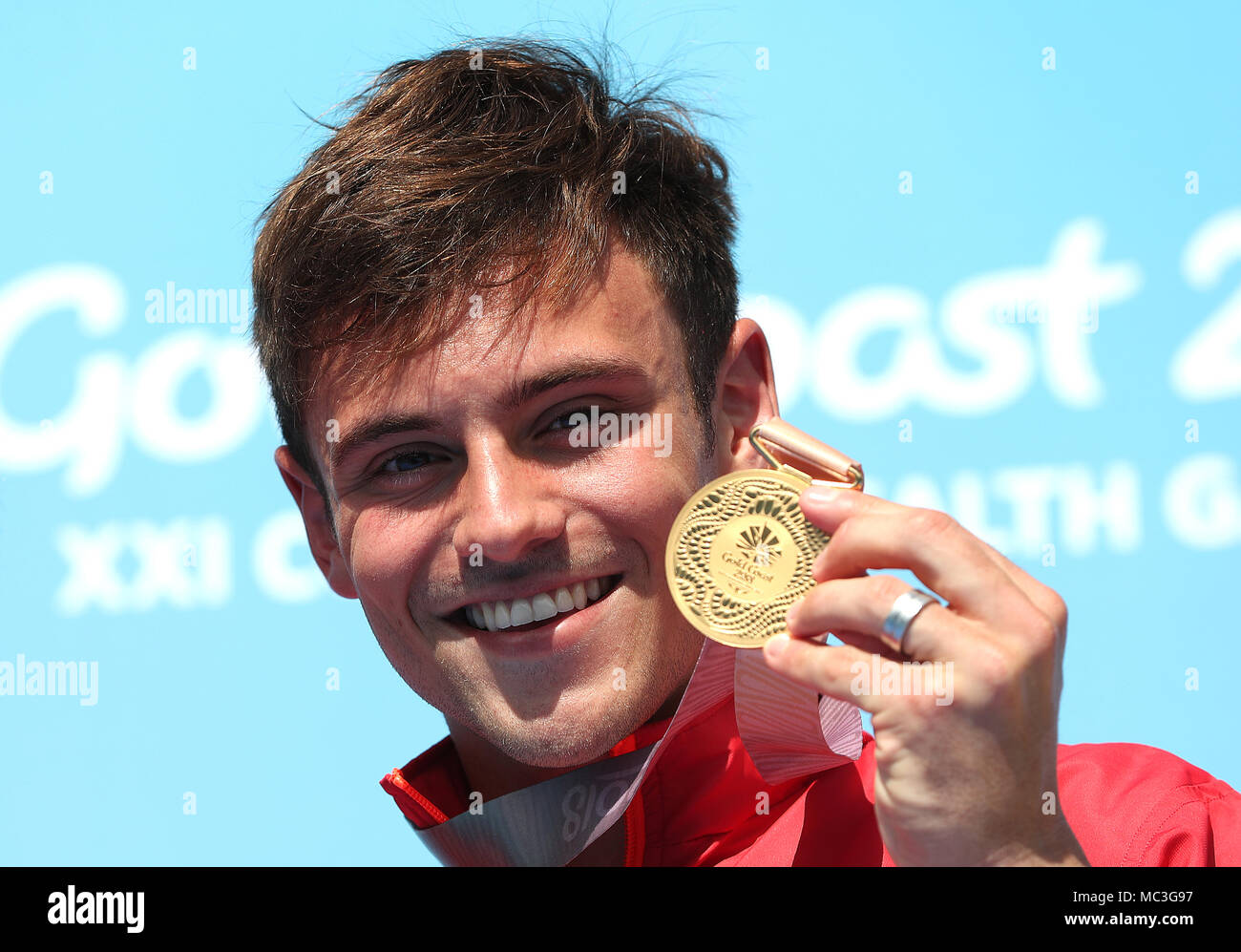 England's Tom Daley with his gold medal in the Men's Synchronised 10m ...