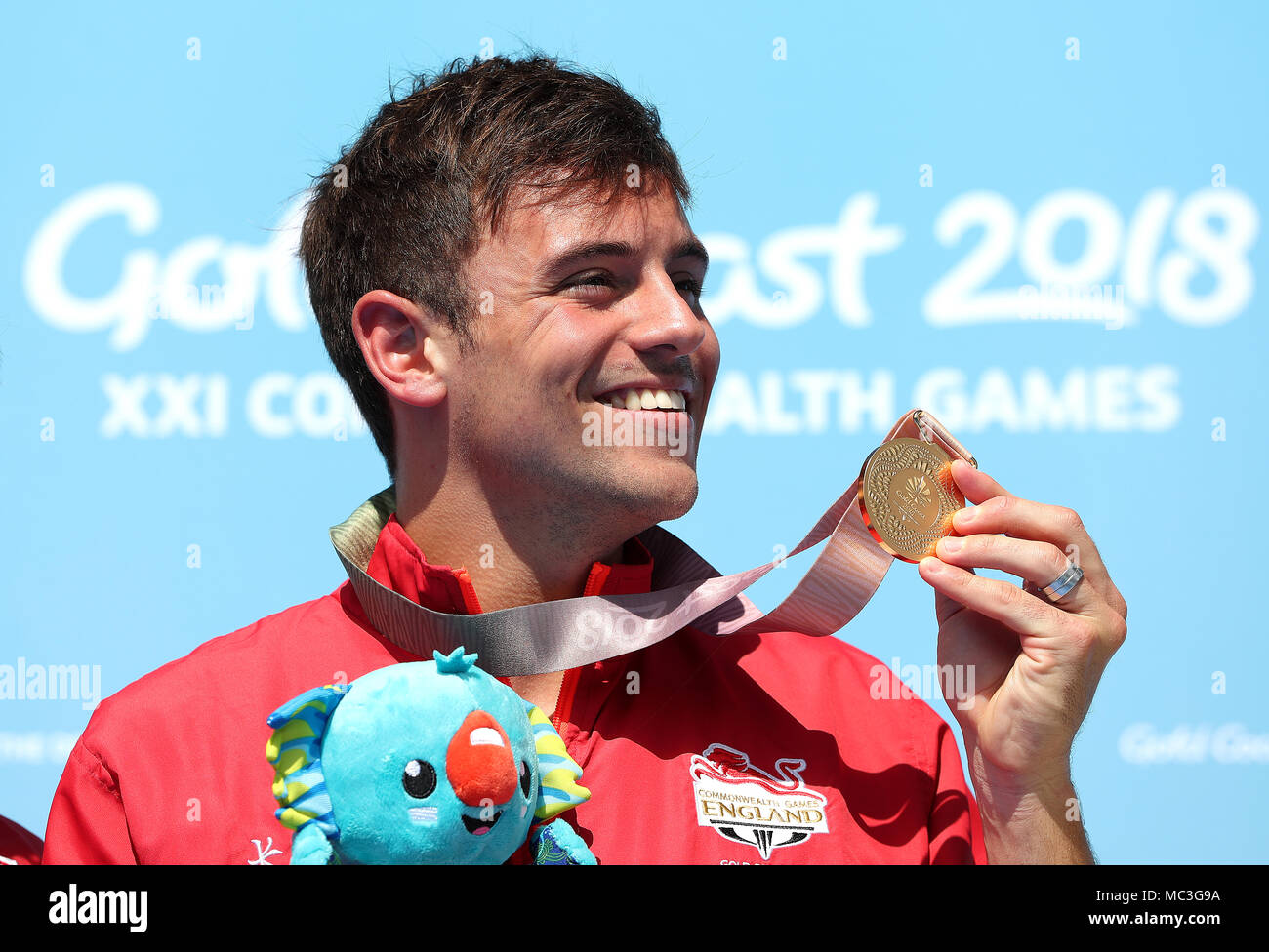 England's Tom Daley with his gold medal in the Men's Synchronised 10m ...