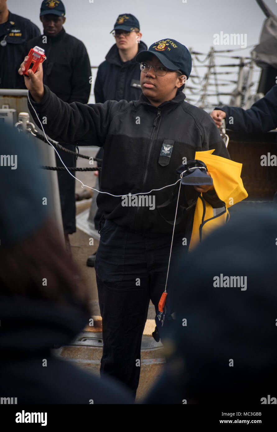 OCEAN (April 2, 2018) Boatswain's Mate 2nd Class Alissa Freeman gives ...