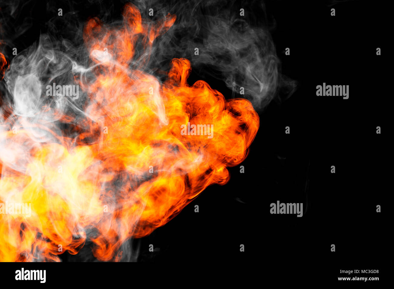 Fire flames background. Dense fiery smoke on a black isolated ...