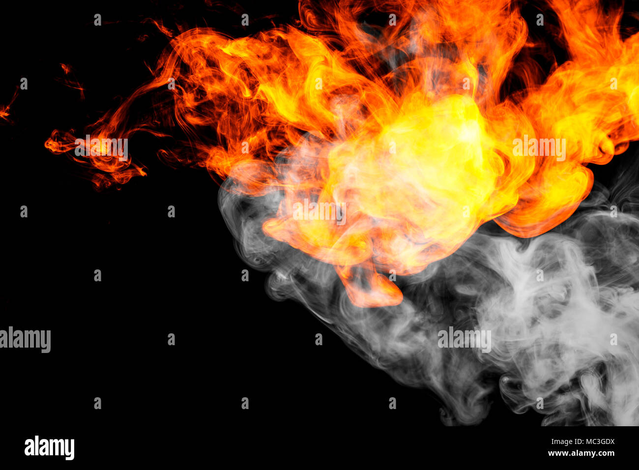 Fire flames background. Dense fiery smoke on a black isolated ...