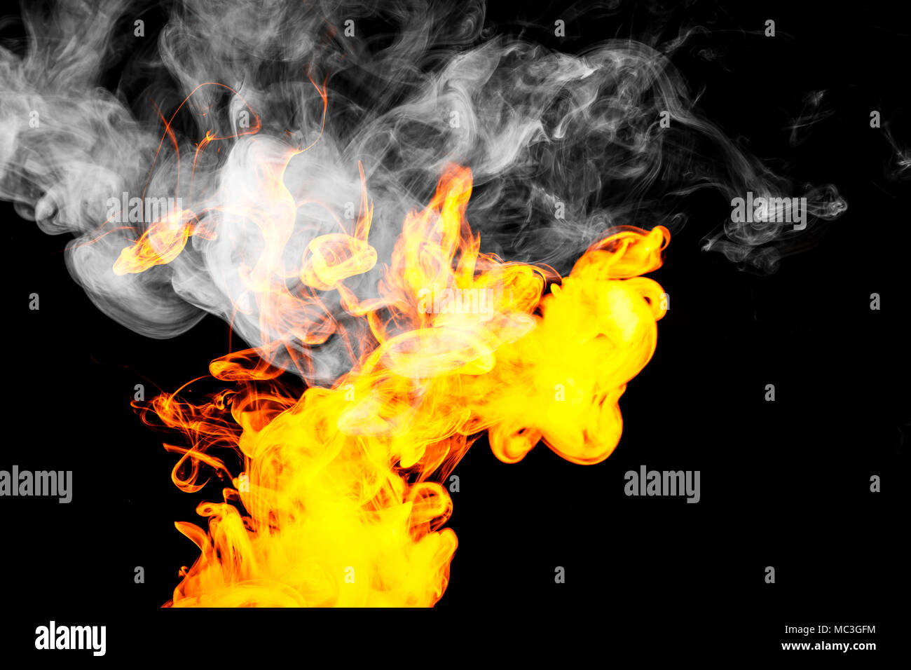 Fire flames background. Dense fiery smoke on a black isolated ...