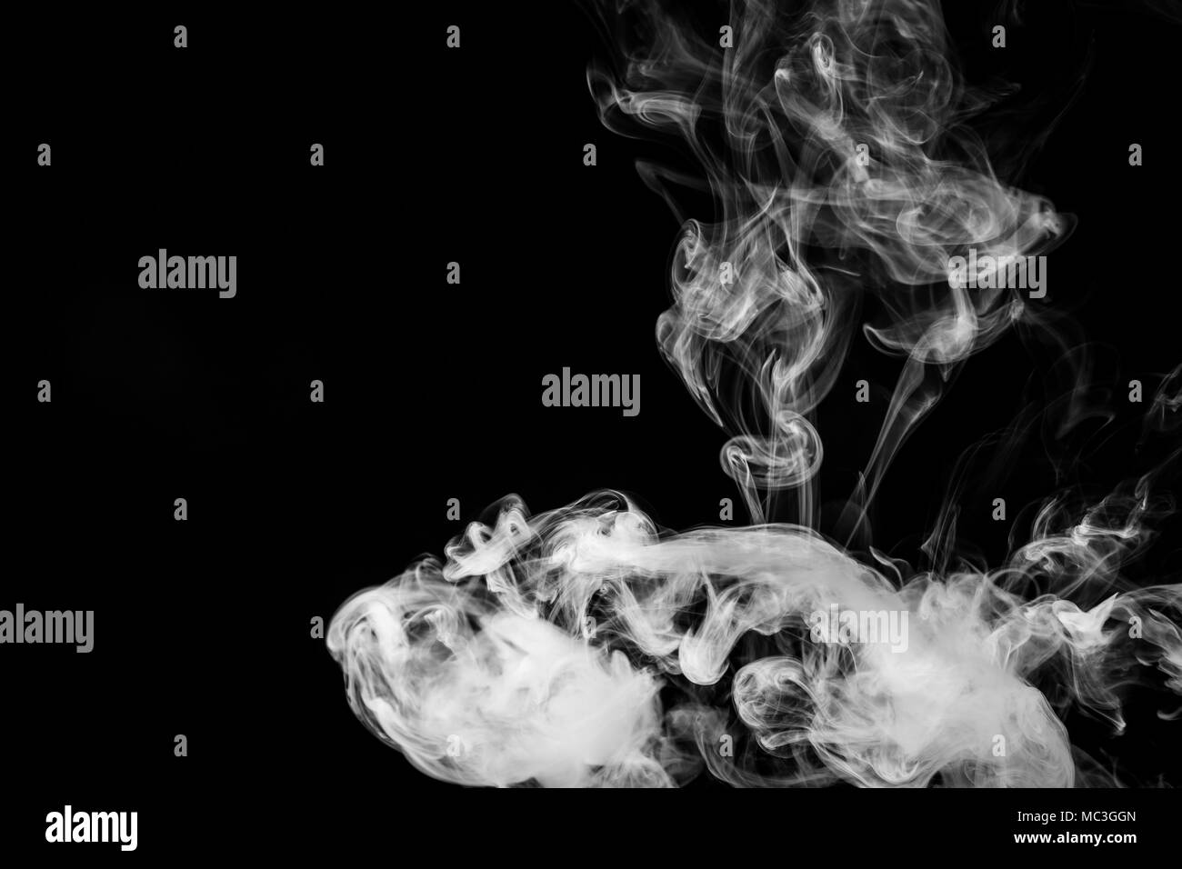 White smoke on black background Stock Photo - Alamy