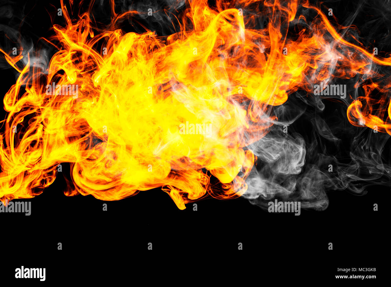 Fire flames background. Colorful fiery smoke on a black isolated ...