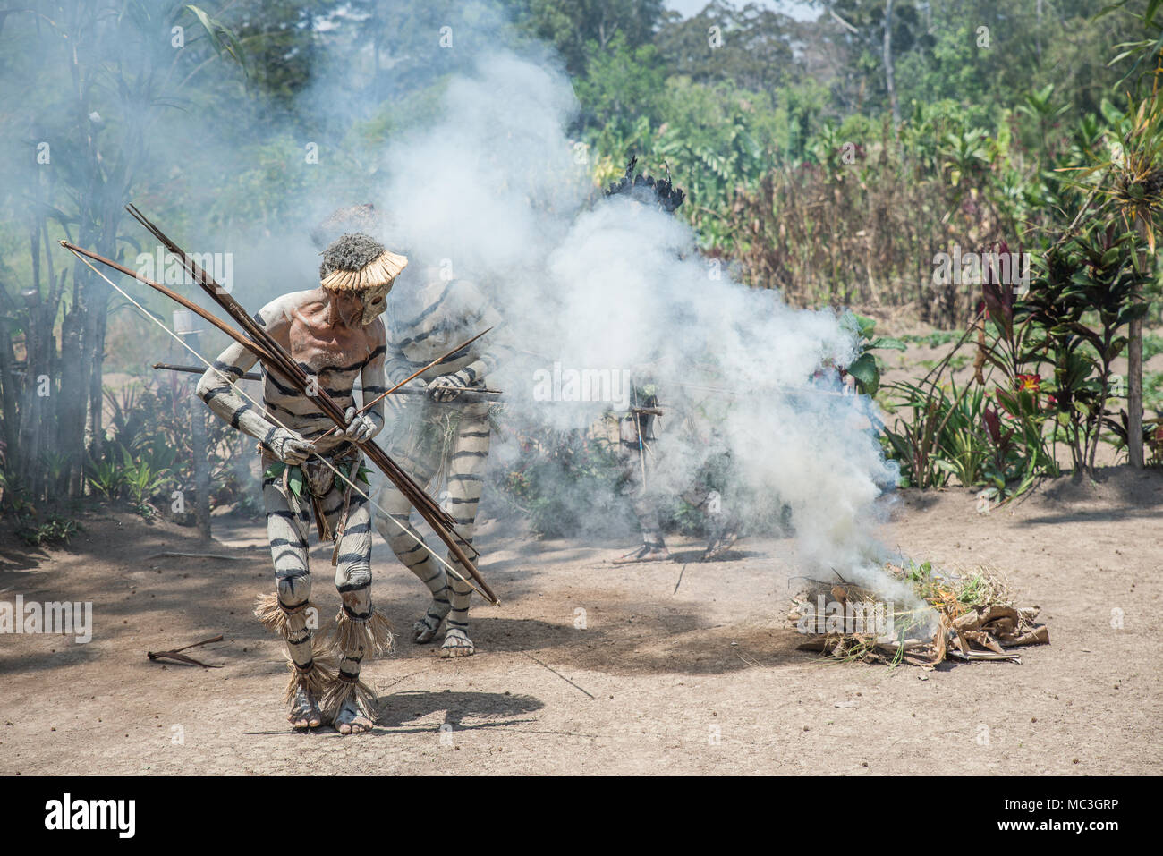 Firemaking performance in a village, Goroka area, Eastern Highlands ...