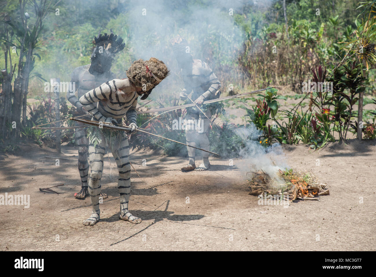 Firemaking performance in a village, Goroka area, Eastern Highlands ...