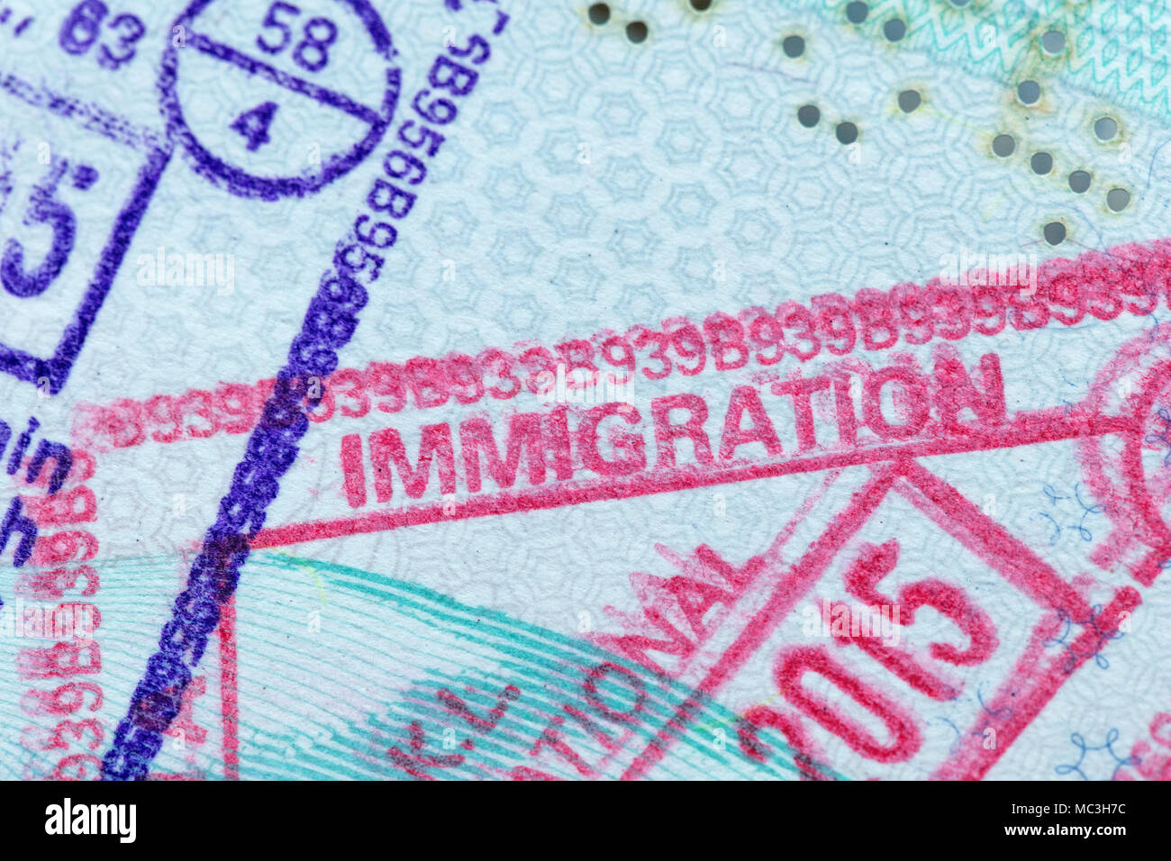 Immigration stamp in a passport Stock Photo - Alamy