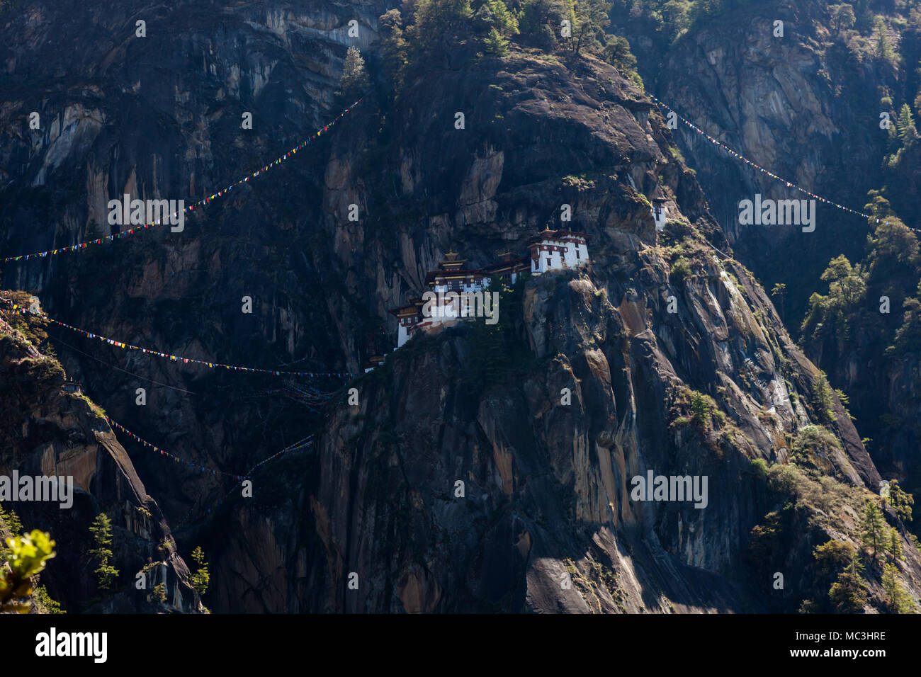 Paro Taktsang aka Tiger's nest is an old monastery situated on a cliff ...