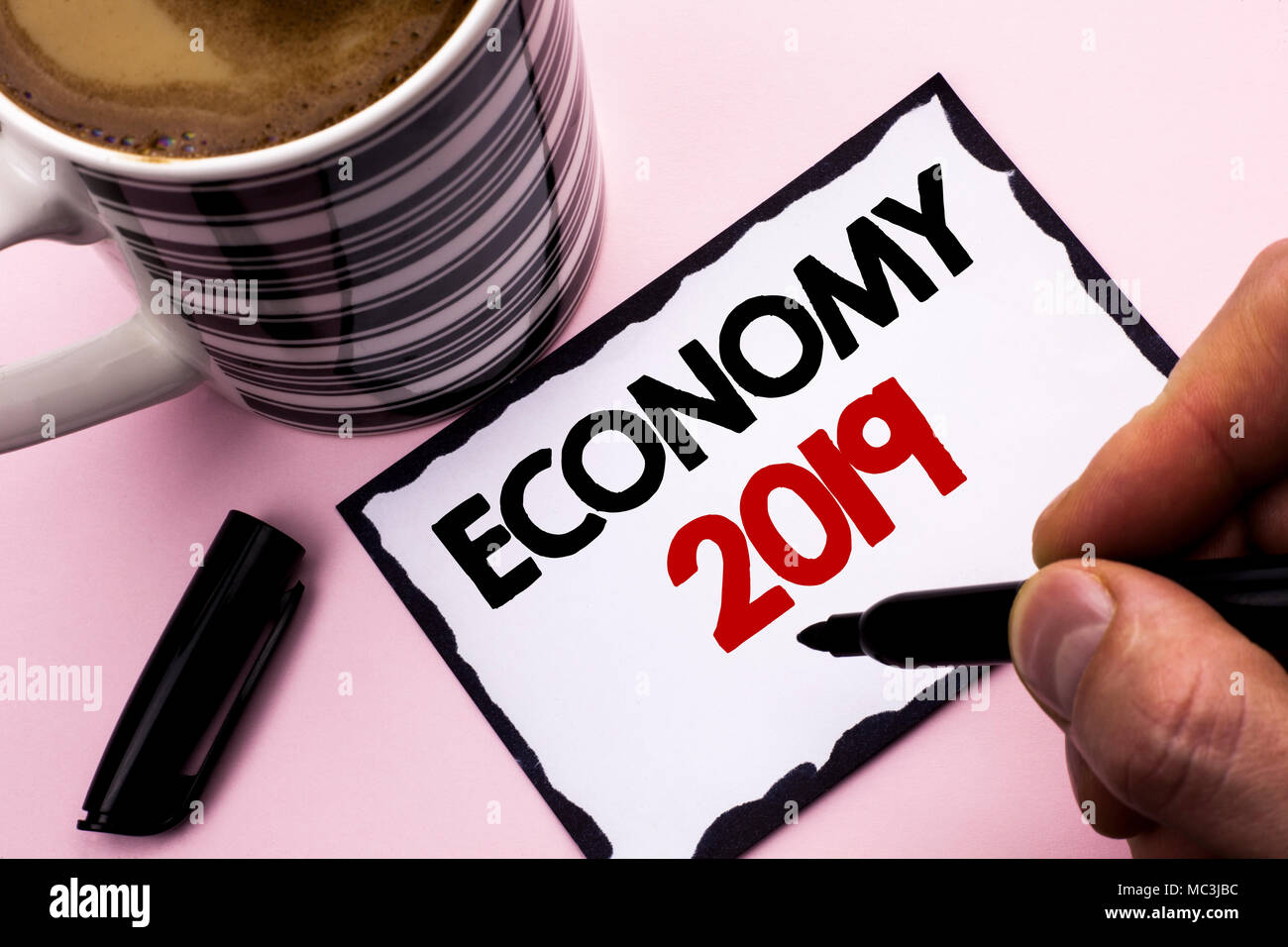 Handwriting text writing Economy 2019. Concept meaning Financial ...