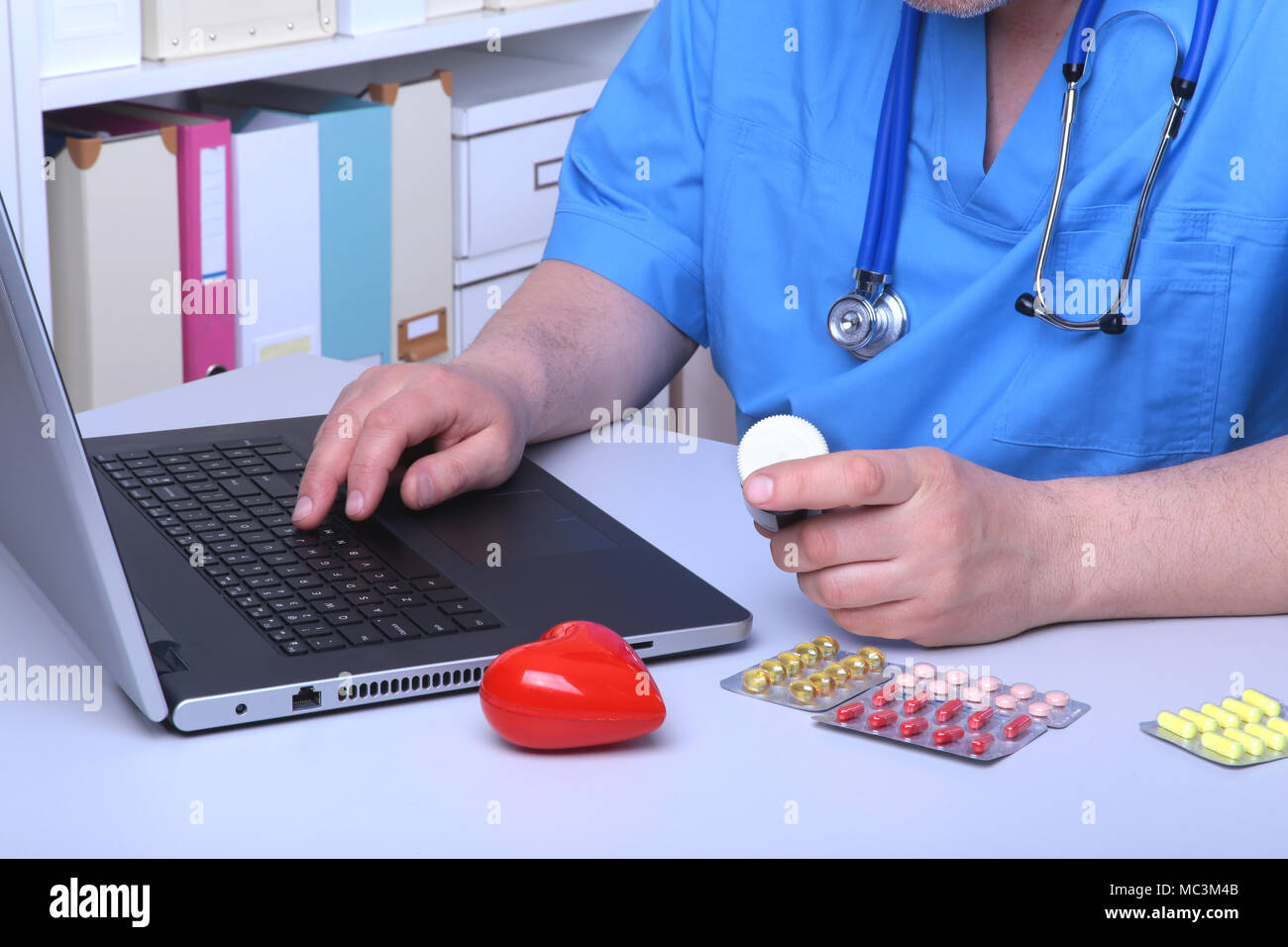 Doctor hand showing drug boxes at Office Desktop. Health care, Medical ...