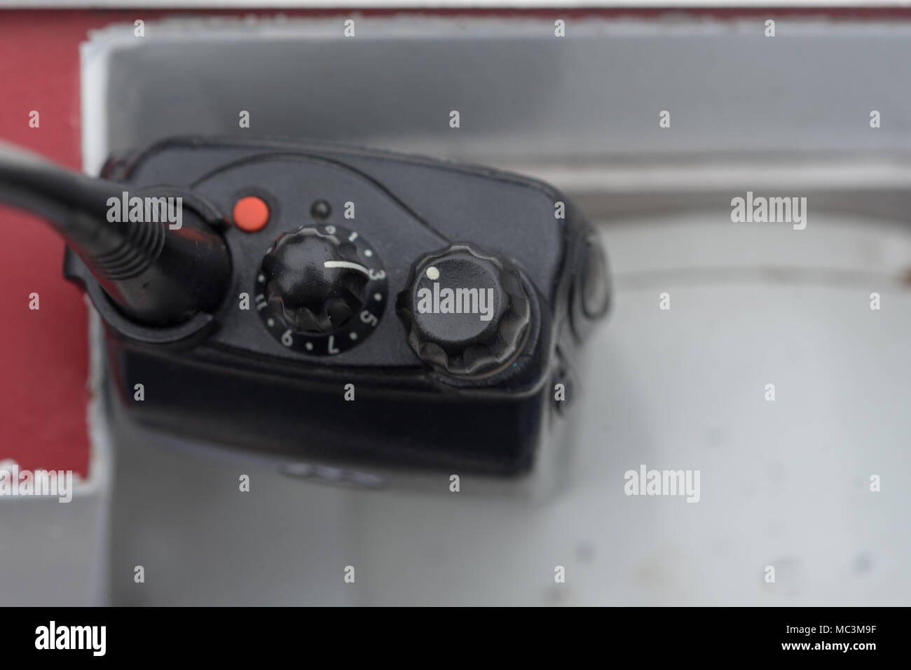 emergency services two way radio with control pointing to channel three ...