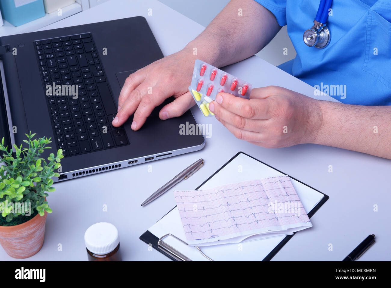 Doctor hand showing drug boxes at Office Desktop. Health care, Medical ...