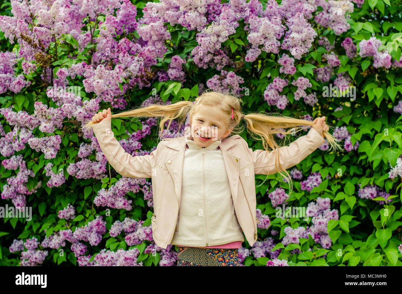 Adorable girl in purple hi-res stock photography and images - Alamy