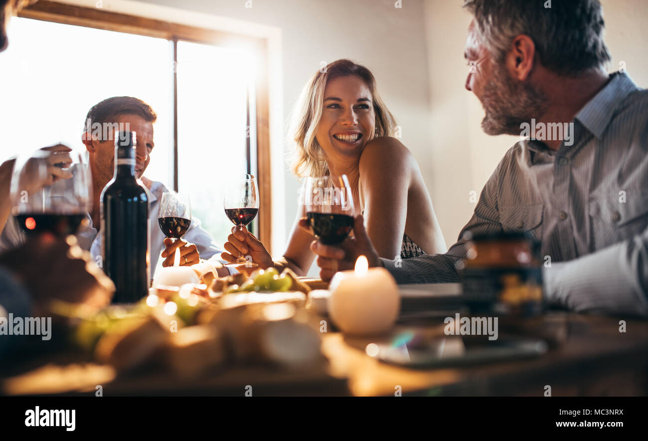 Group people sitting dining table hi-res stock photography and images ...