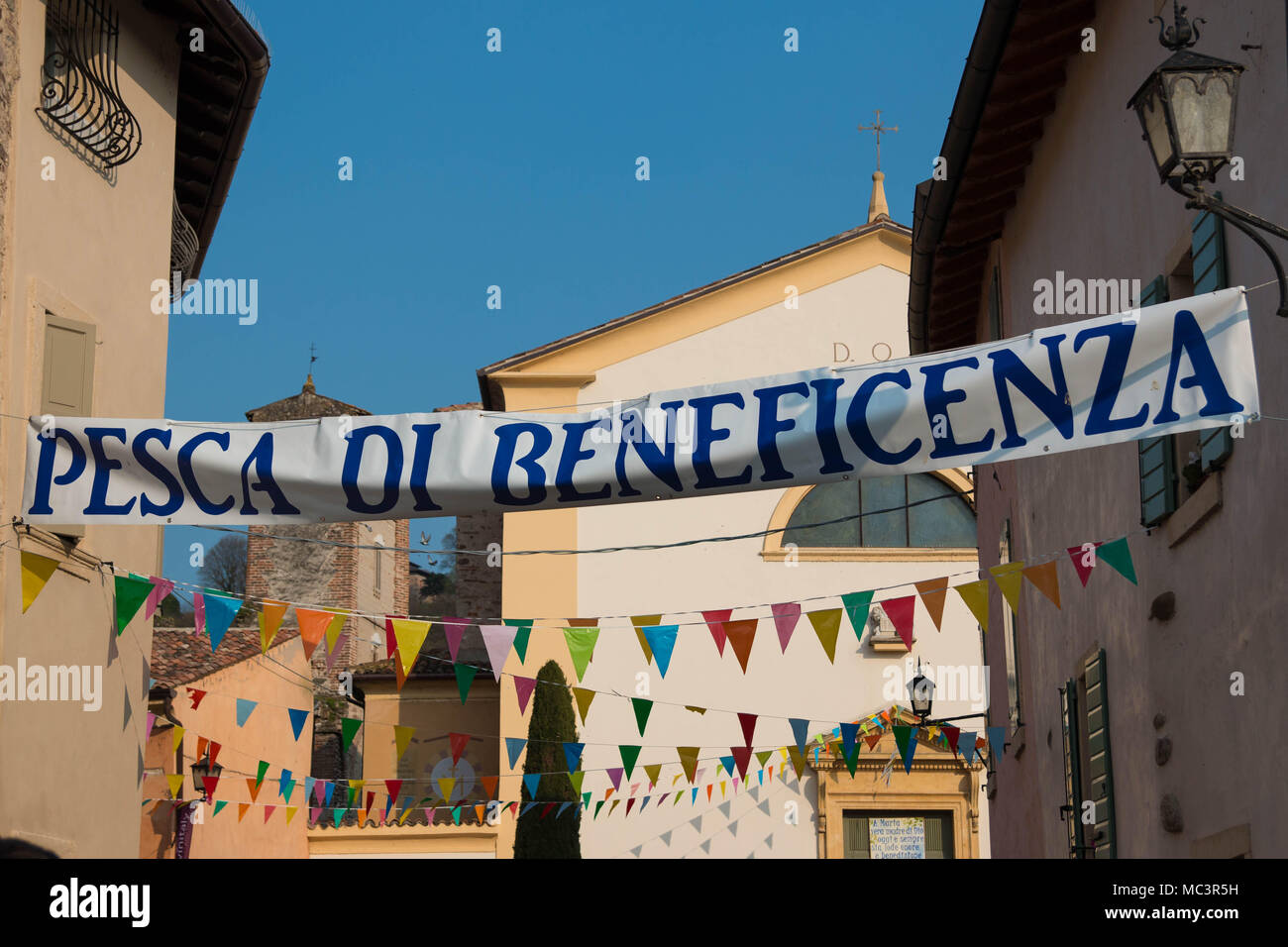 Italian charity raffle banner in charming village during parish ...