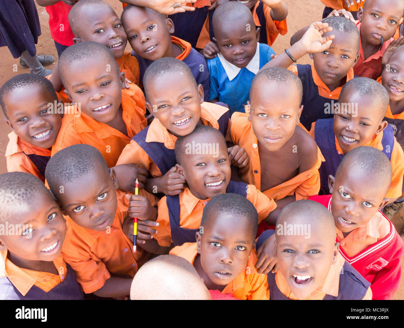 Uganda. June 13 2017. A group of happy primary-school children smiling ...