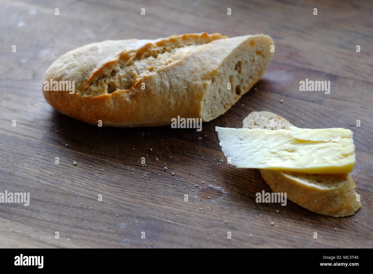 Baguette slice with cheddar cheese Stock Photo - Alamy