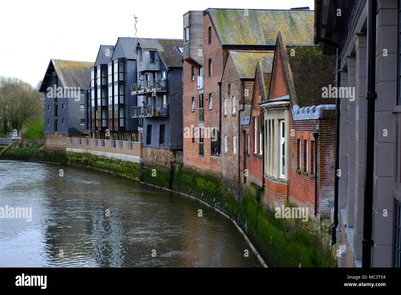 Riverside buildings next to the river Ouse in Lewes, East Sussex, UK ...