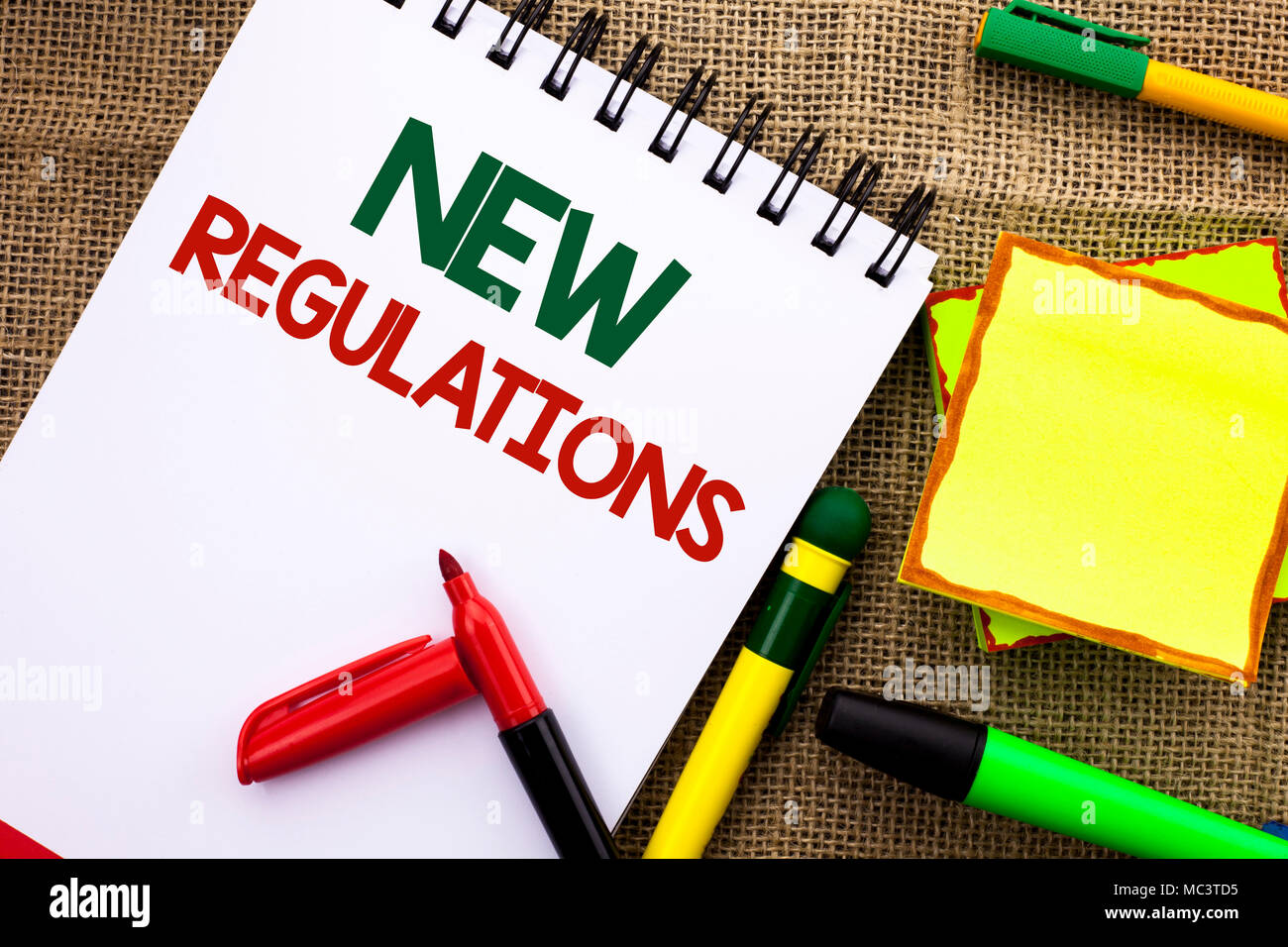 Writing note showing New Regulations. Business photo showcasing Change ...