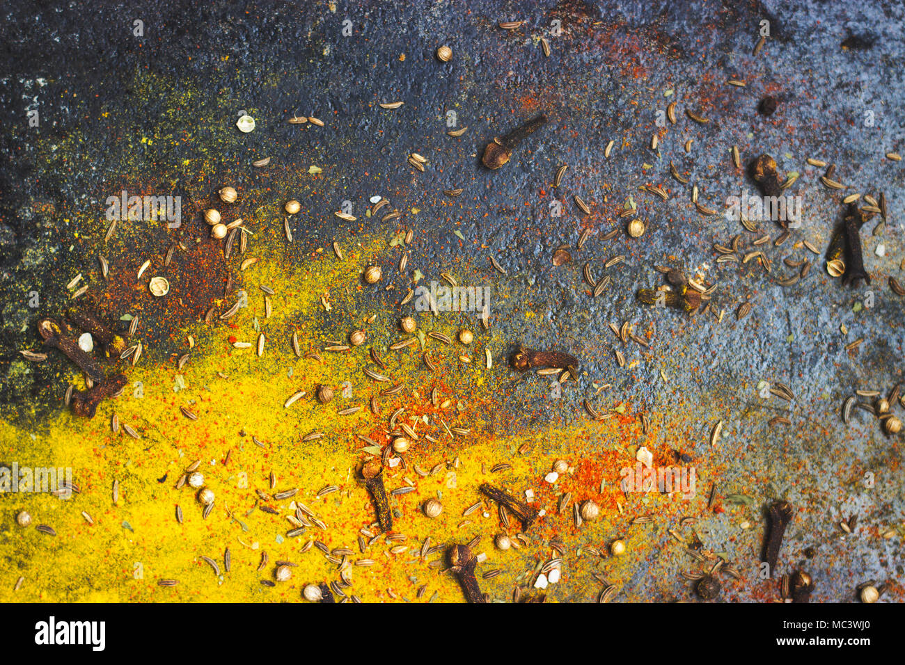 Spices - Curry, paprika powder and clove on dark background; food ...