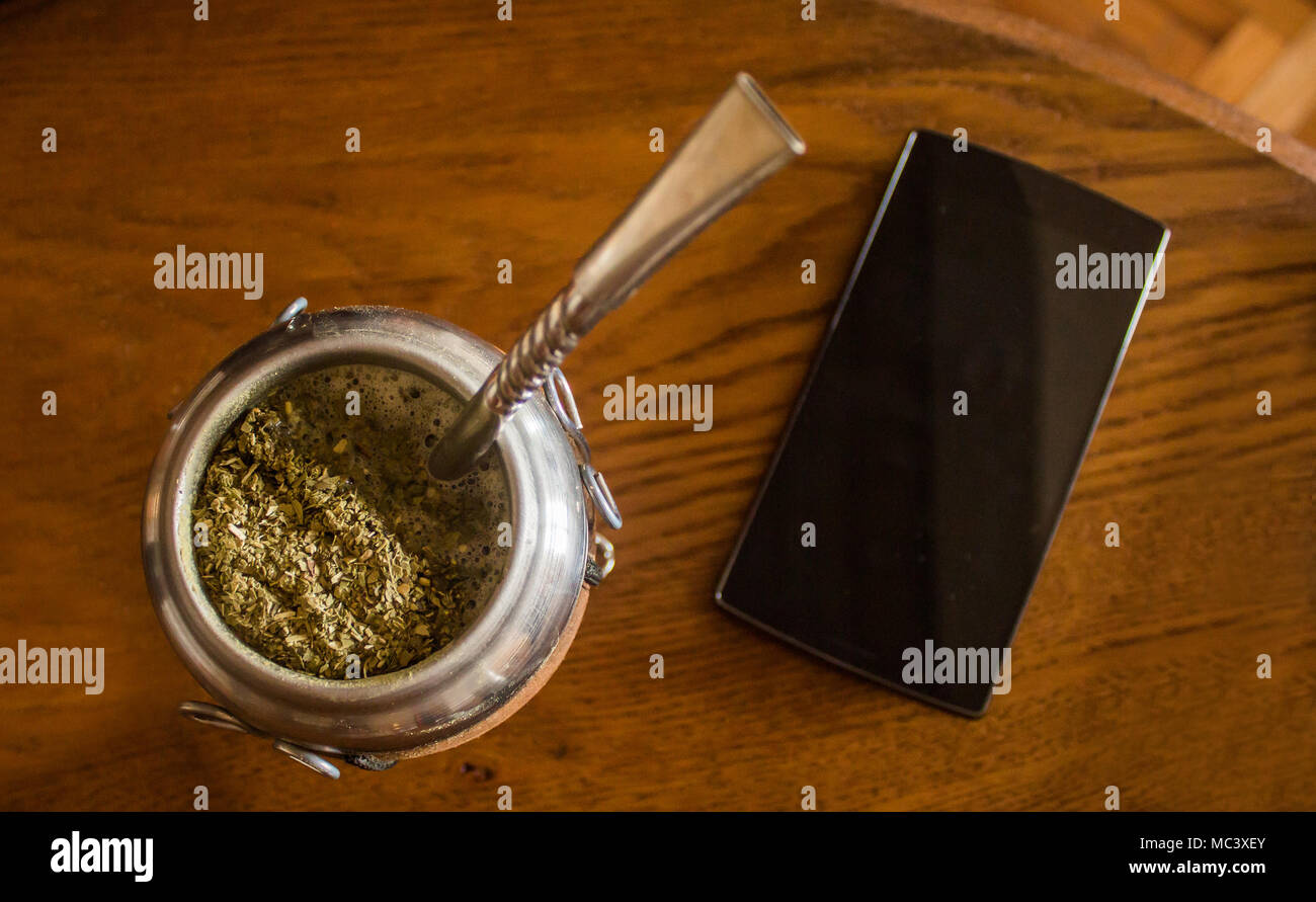 traditional mate with cell phone from above Stock Photo - Alamy