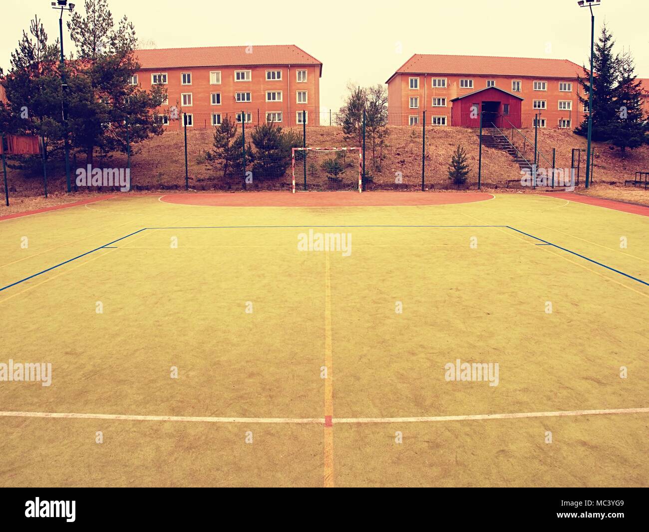 Empty gate. Outdoor football or handball playground plastic light green ...