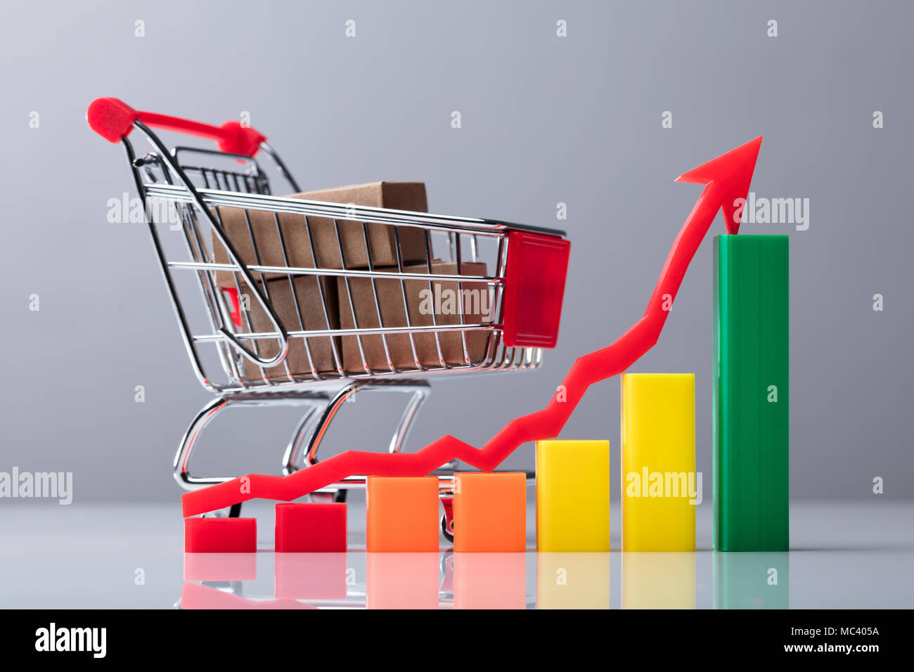 Graph With Arrow Sign Showing Upward Direction In Front Of Shopping ...