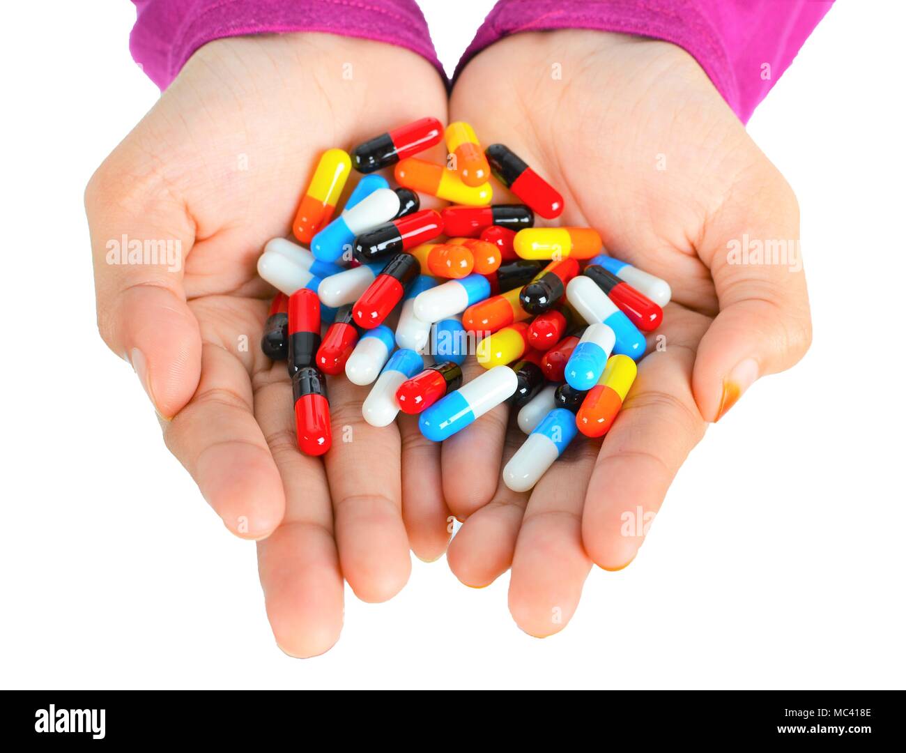 Top view of the pills on the hand and white background, A hand hold the ...