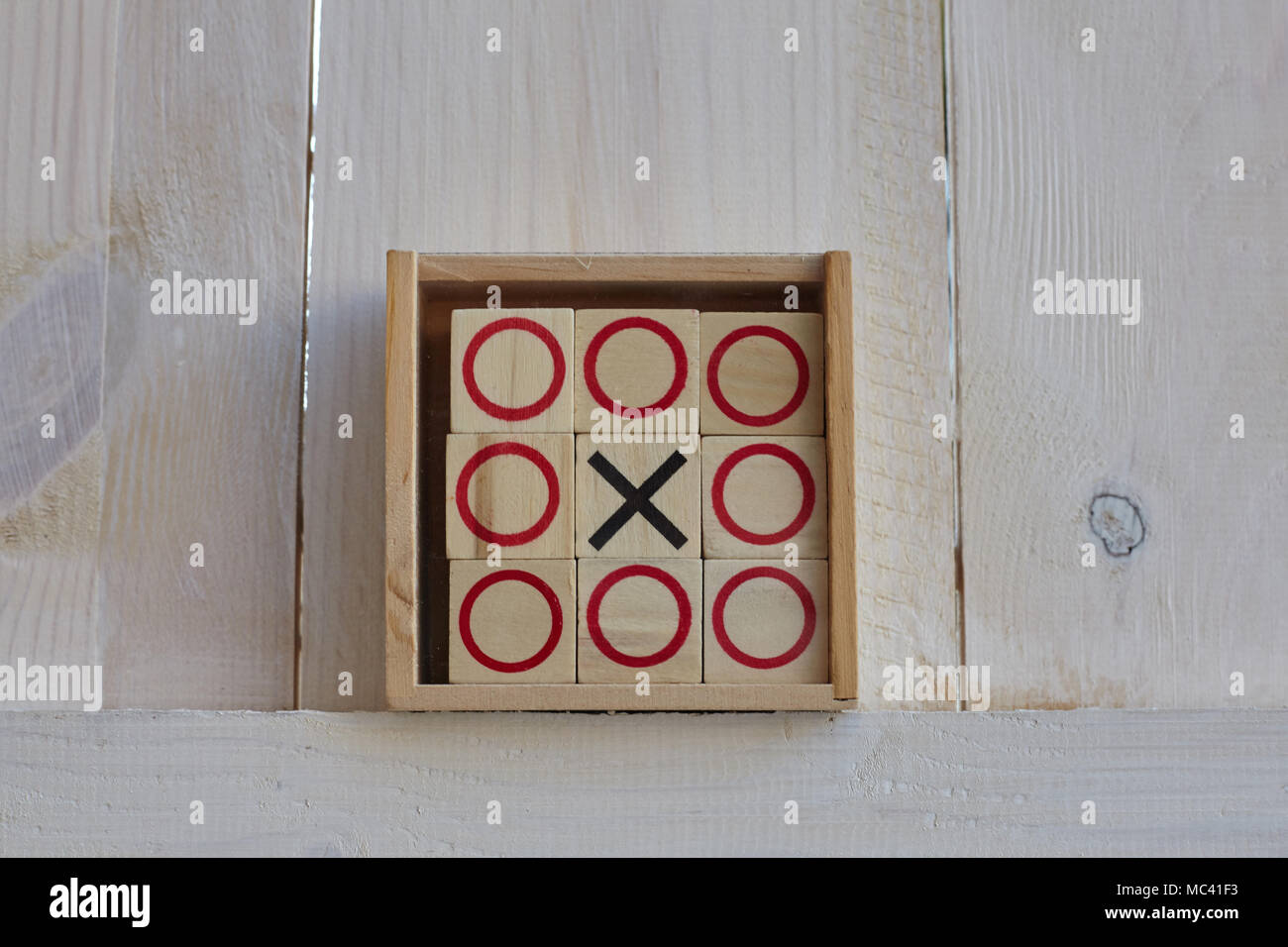 Tic-tac-toe game on white wooden background Stock Photo - Alamy