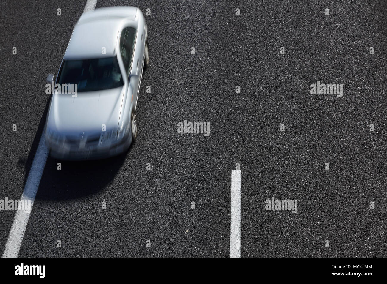 Car in motion blur on a highway Stock Photo - Alamy