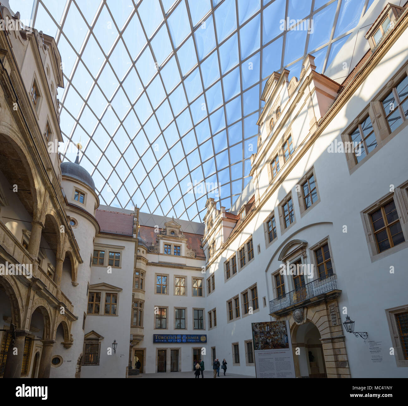 Inner courtyard of Dresden castle covered by glass roof as lobby of ...